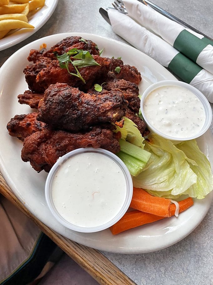 These aren't just wings; they're a religious experience with crispy skin, tender meat, and enough heat to make you temporarily forget you're in Alaska.