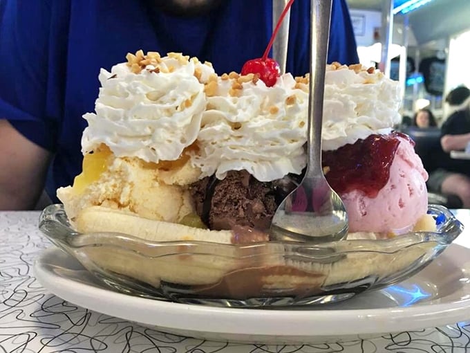 Behold, the Everest of desserts! This banana split isn't just a treat, it's a dare. Bring friends, or prepare for the sweetest food coma ever.