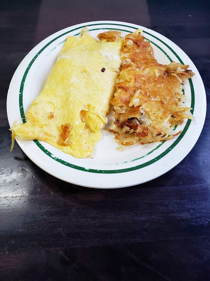 Behold the perfect marriage of fluffy eggs and crispy hash browns. This plate doesn't need fancy garnishes or Instagram filters&mdash;it's confident in its delicious simplicity.