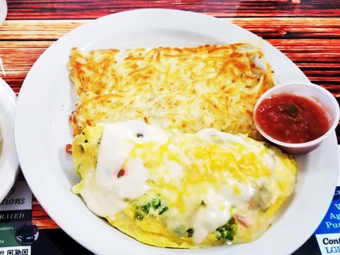 Veggie lovers, rejoice! This omelet is so packed with greens, it's practically a salad. A warm, cheesy, egg-wrapped salad of dreams.