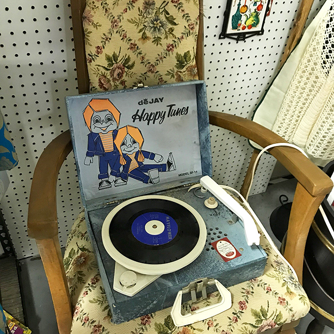 Spin me right round, baby! This vintage record player is ready to drop the needle on your favorite oldies. Time to dust off those dance moves!