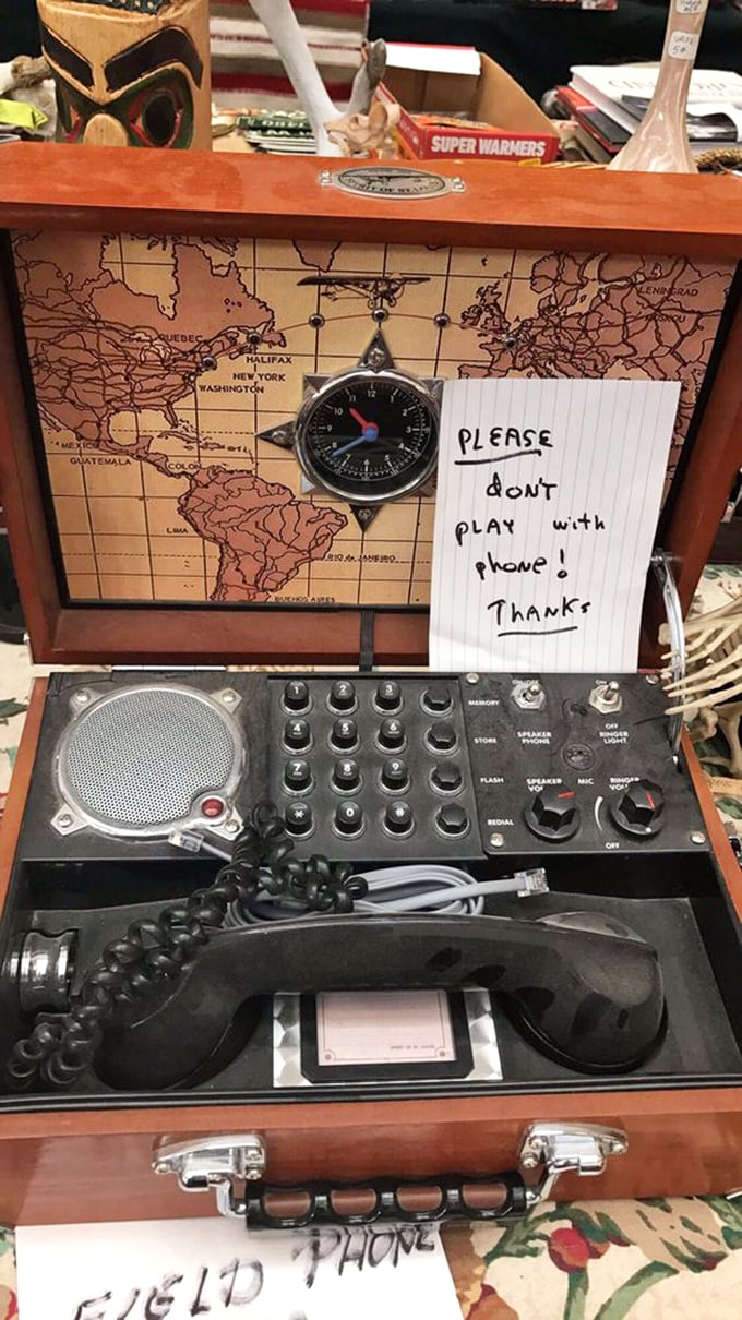 "Don't play with phone!" warns the sign, but this vintage communication device is begging for a starring role in your steampunk novel.