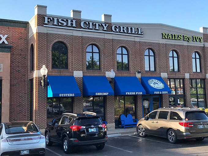 Fish City Grill: Bringing coastal charm to Edmond! Those blue awnings are like a wink from the sea.