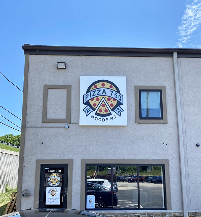 Pizza 750: Where wood-fired dreams come true. It's like your pizza went to finishing school and came back with a fancy degree in deliciousness.