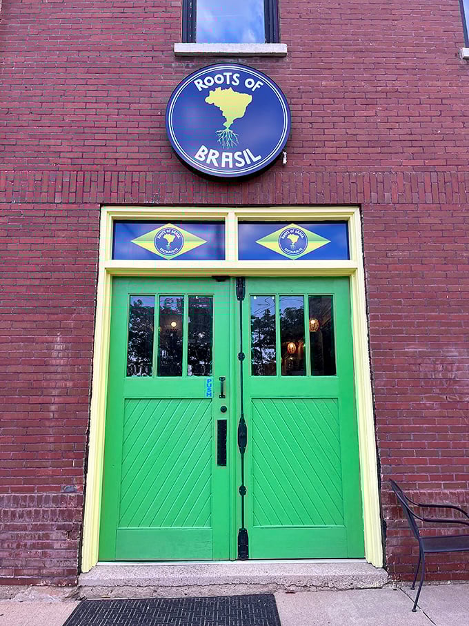 Roots of Brasil: A slice of Rio in Sioux Falls! Those vibrant green doors are like a portal to South American seafood paradise.