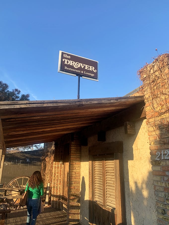 The Drover: Where John Wayne meets Julia Child. This rustic retreat looks like it wandered off the prairie and decided to serve up some serious steak.