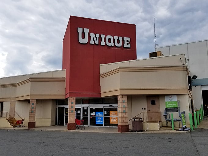 "Unique by name, unique by nature. This thrift store's bold sign is like a siren call for savvy shoppers."