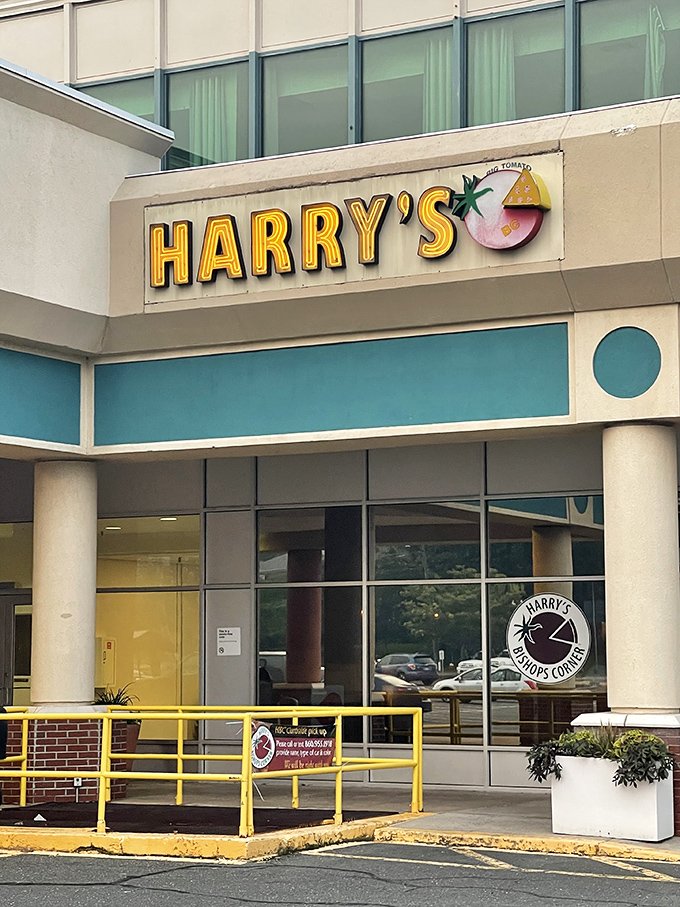 Harry's sign shines like a pizza-lover's North Star. Follow it to wood-fired perfection and creative toppings galore!
