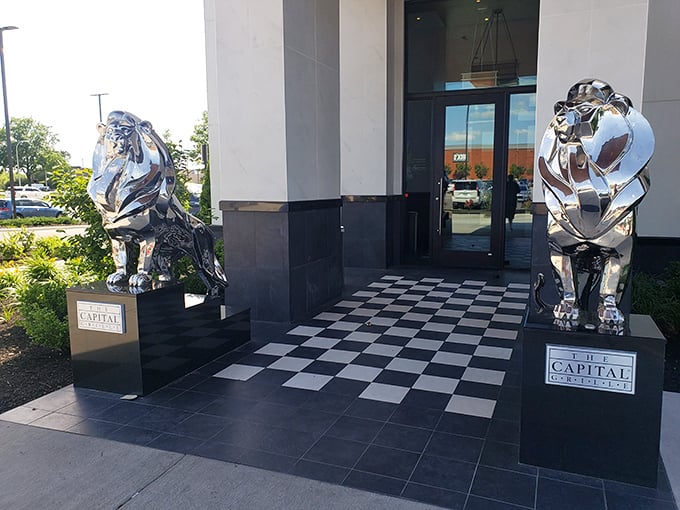 Lions guarding the entrance? Must be some top-notch beef inside! The Capital Grille's exterior screams "fancy night out" louder than a Derby Day hat.