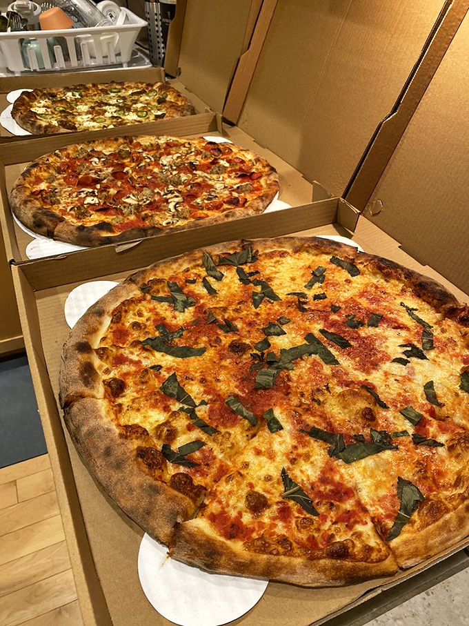 The holy trinity of pizza boxes &ndash; it's like Christmas morning, but instead of presents, you get the gift of gourmet goodness.