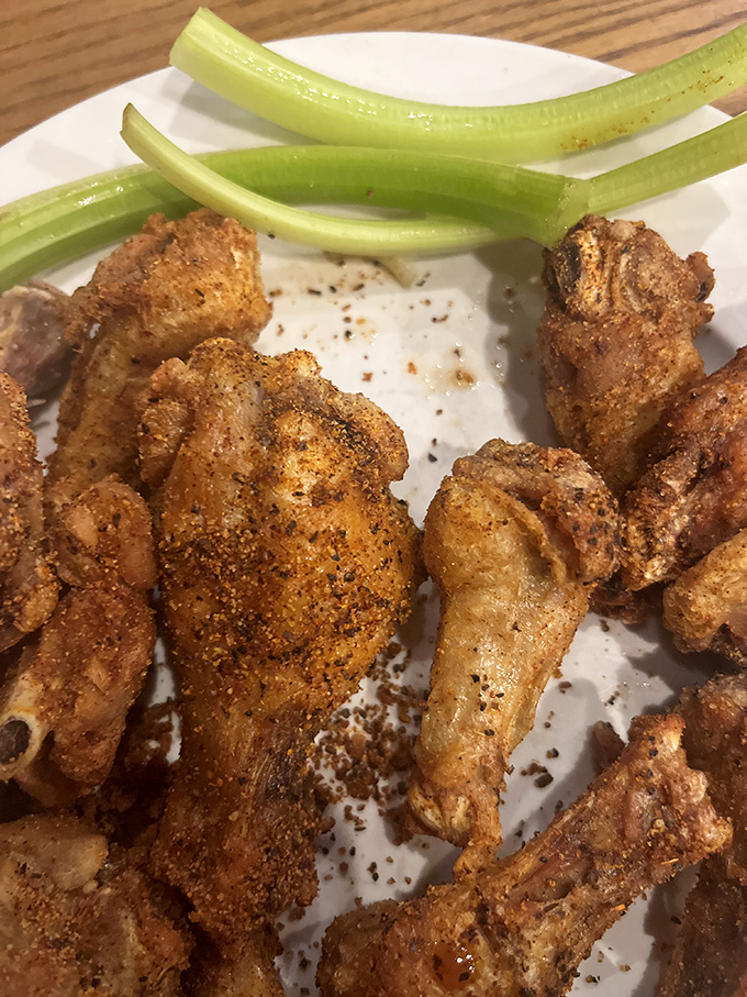 These dry-rubbed wings with their perfect spice coating might make you temporarily forget your table manners. Worth every napkin.