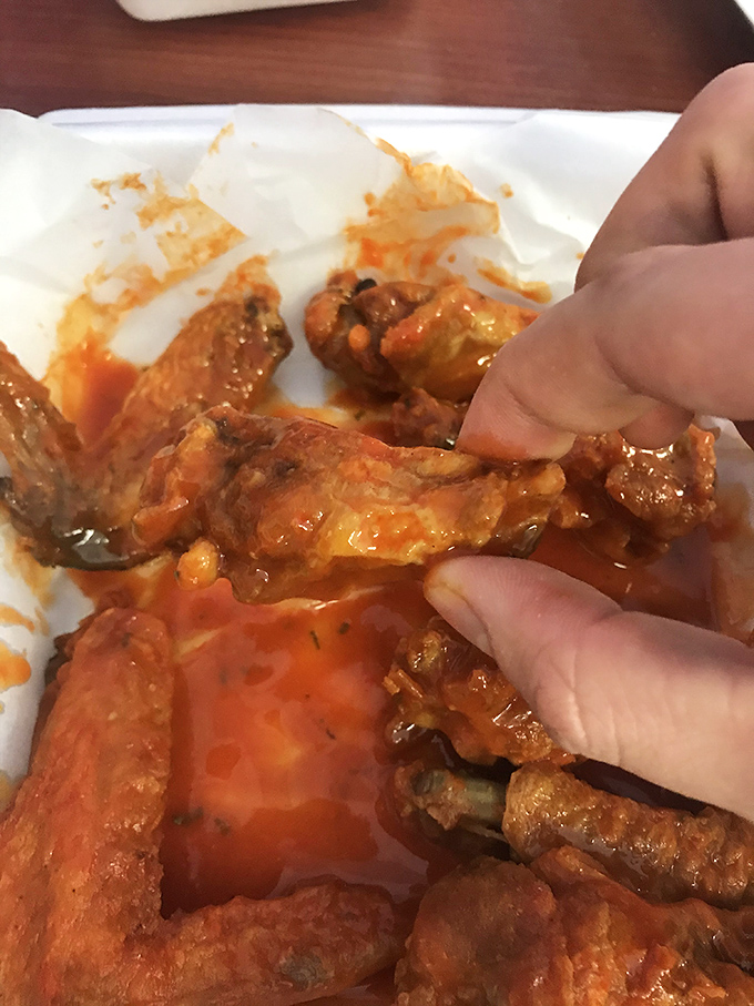 The moment of truth&mdash;that first bite when the crispy exterior gives way to juicy meat underneath. This is why napkins were invented, folks.
