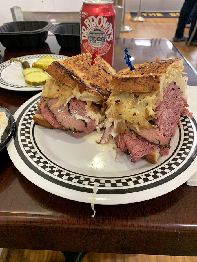 The Leaning Tower of Deliciousness! This Reuben sandwich is so tall, it needs its own zip code.