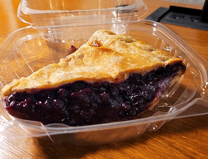 Blueberry bonanza! This pie isn't just dessert, it's a celebration of Maine's favorite fruit in all its purple-stained glory.