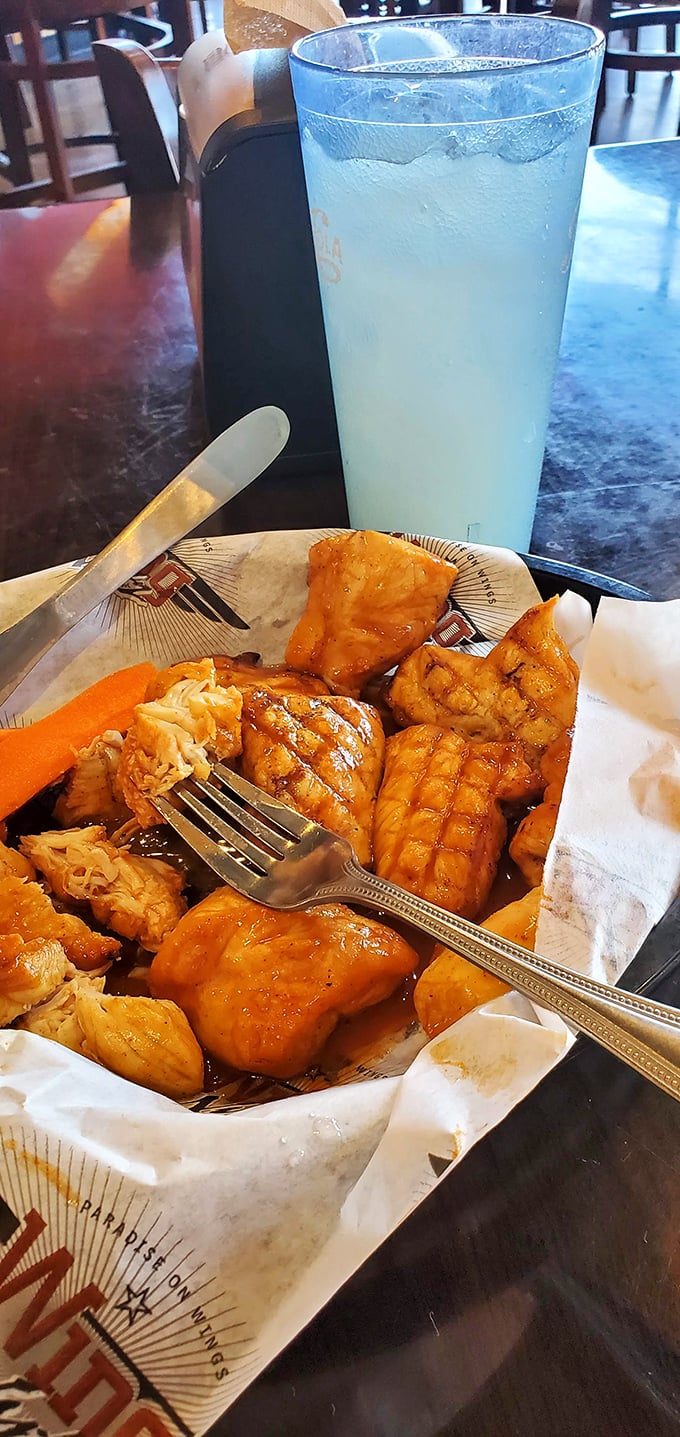 These boneless beauties swim in sauce alongside a refreshing blue oasis&mdash;proof that simple pleasures remain life's greatest luxury.