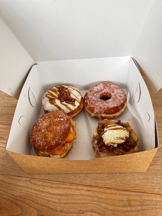 A box of joy, served fresh daily. These donuts are like edible works of art – if Picasso had a sweet tooth.