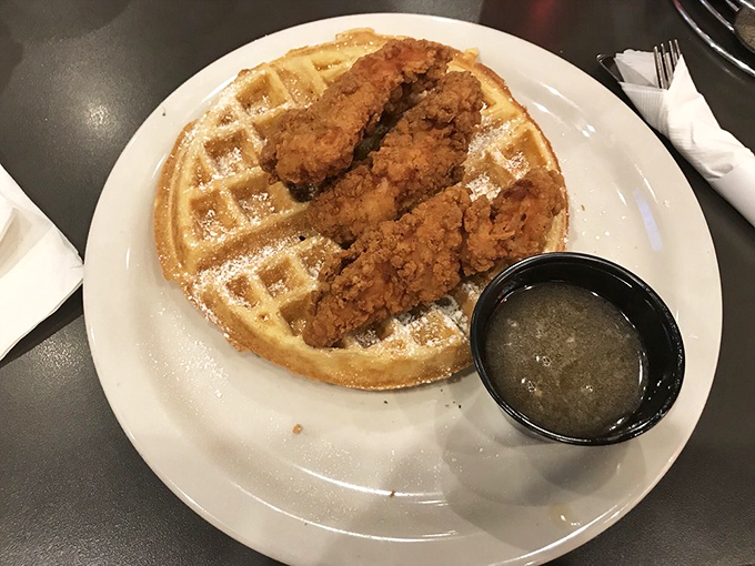The ultimate power couple: crispy chicken and fluffy waffle. It's like Romeo and Juliet, but with a happier, tastier ending.