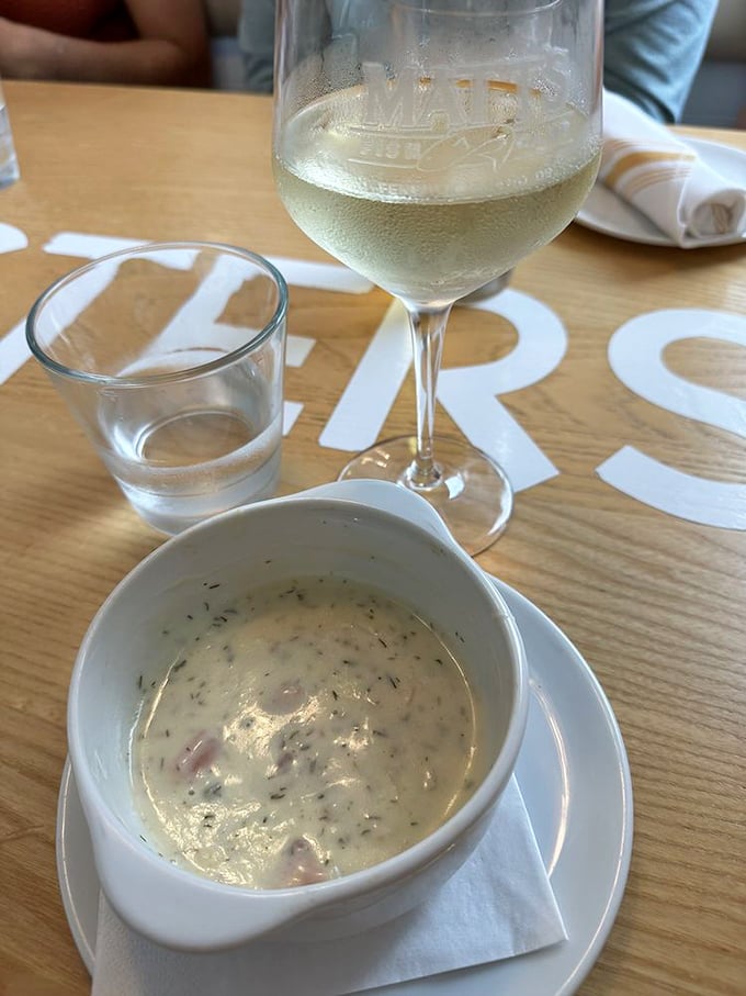 A glass of white and a bowl of chowder &ndash; it's like the ocean and land decided to throw a party in your mouth.