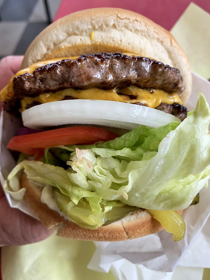 Double the patty, double the fun! This burger is like the Hulk of handheld meals – big, beefy, and ready to smash your hunger.