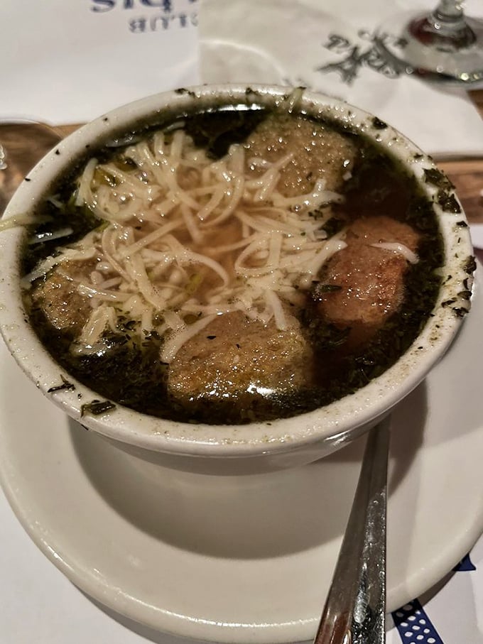 Behold, the Holy Grail of soups! This French onion masterpiece is so cheesy, it could probably solve world peace if we let it.