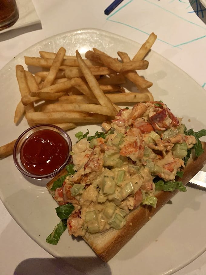 The lobster roll that launched a thousand ships... or at least a few enthusiastic road trips. It's like summer vacation wrapped in a bun.
