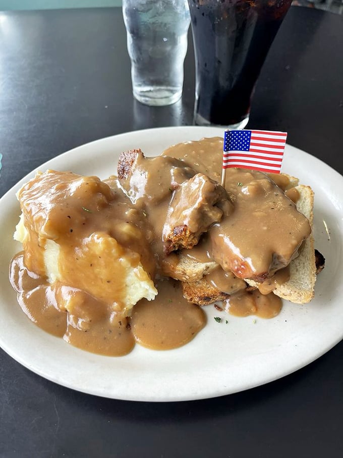 The meatloaf sandwich arrives with its own tiny American flag, as if to say, "This is what makes this country great." And who could argue?