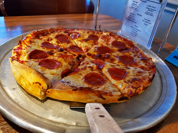 Simplicity at its finest! This Margherita pizza is so fresh, you'd think the basil was doing yoga on your plate.