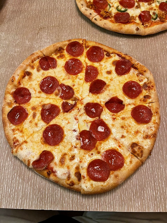 Pepperoni perfection! This pie has more spots than a dalmatian at a polka dot convention.