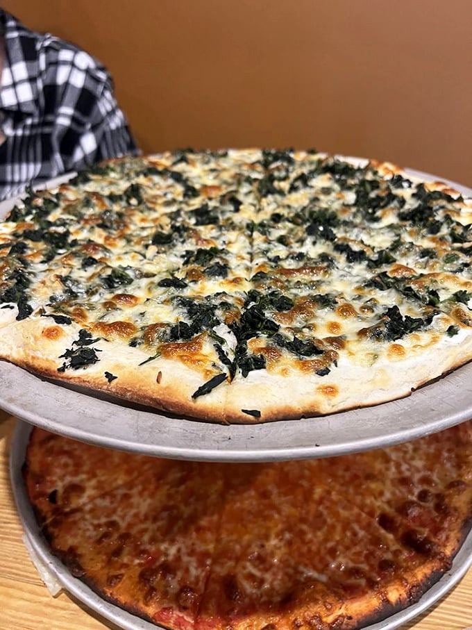 The yin and yang of pizza! Plain simplicity meets leafy sophistication in this half-and-half masterpiece.