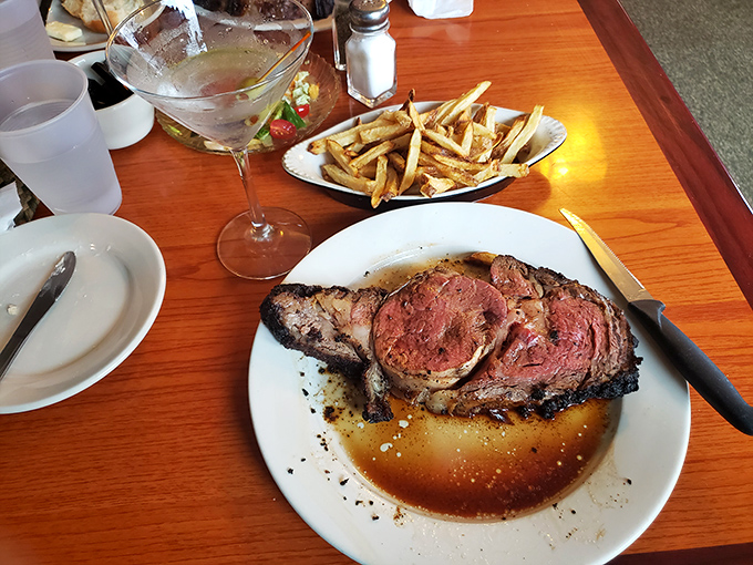 A plate that screams "comfort food royalty." This prime rib and fries combo is the culinary equivalent of a warm hug.