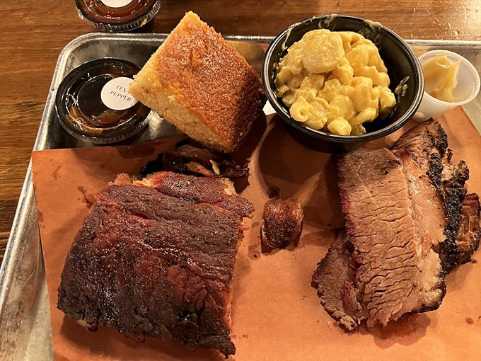 A plate that screams "food coma ahead!" Brisket so tender, it practically melts on your fork.