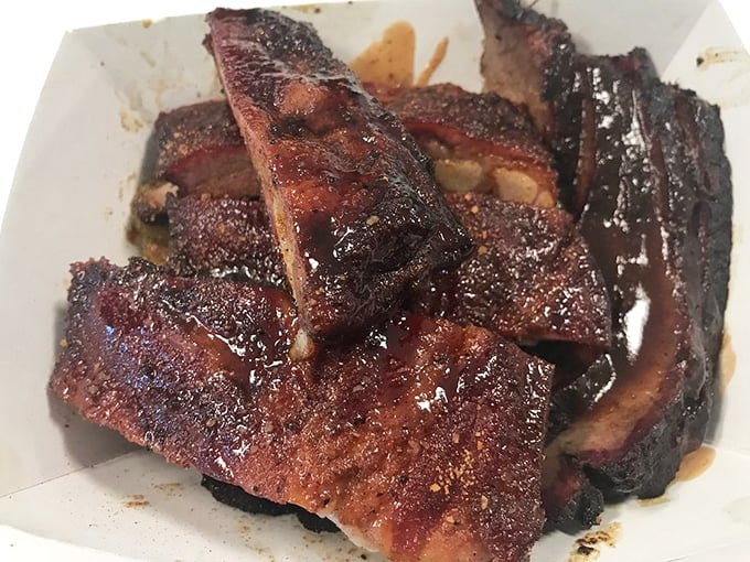 Brisket and ribs: the dynamic duo of BBQ. It's like Batman and Robin, but way more delicious and slightly less crime-fighting.