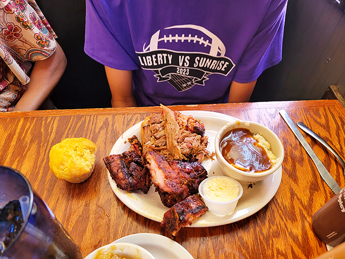The dynamic duo of BBQ! Ribs and pulled pork join forces to create a plate that's more satisfying than finding the TV remote on the first try.