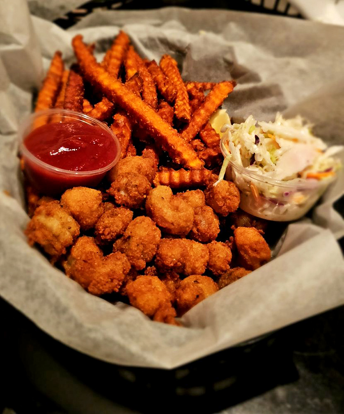 Crispy, crunchy, seafood-y heaven! This basket of golden goodness is like a treasure chest for your taste buds.