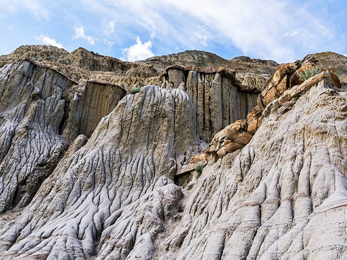 Rock formations that look like nature's attempt at modern art. These Badlands buttes are proof that Mother Earth has a flair for the dramatic.