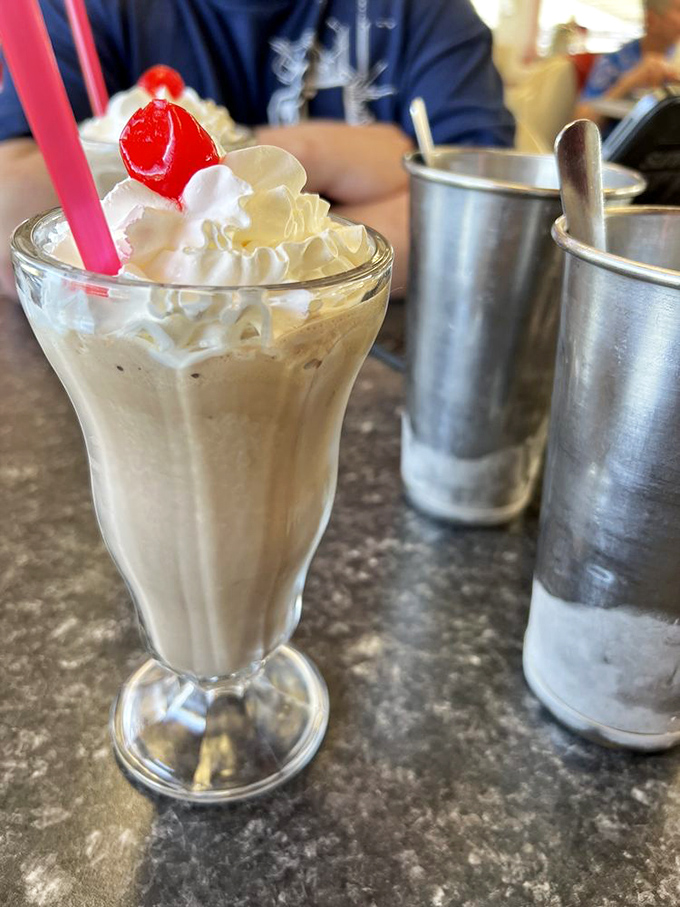 Vanilla, but far from plain! This creamy concoction is topped with enough whipped cream to make your dentist nervously adjust their collar.