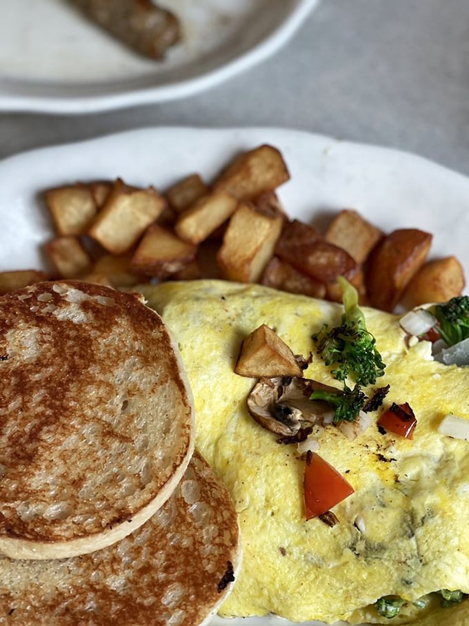 Veggie lovers, rejoice! This omelette is packed with more colors than a tie-dye shirt at a Grateful Dead concert.
