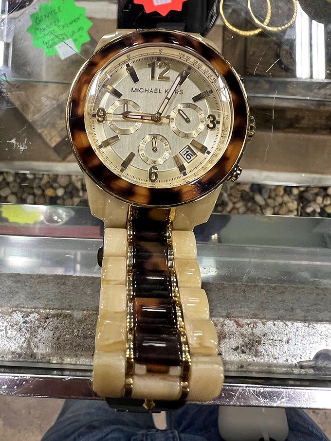 Time waits for no one, but this Michael Kors watch might make you wish it did. A little slice of luxury at thrift store prices!
