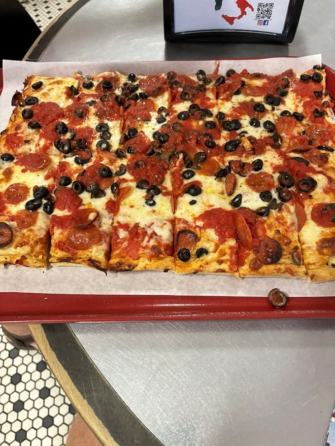 A pizza party for your taste buds! This topping-laden masterpiece is like a "Choose Your Own Adventure" book, but every choice leads to deliciousness.