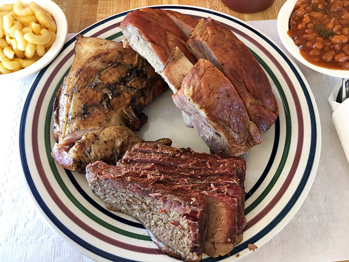 The holy trinity of BBQ! Brisket, chicken, and ribs join forces to create a flavor explosion that'll knock your socks off.