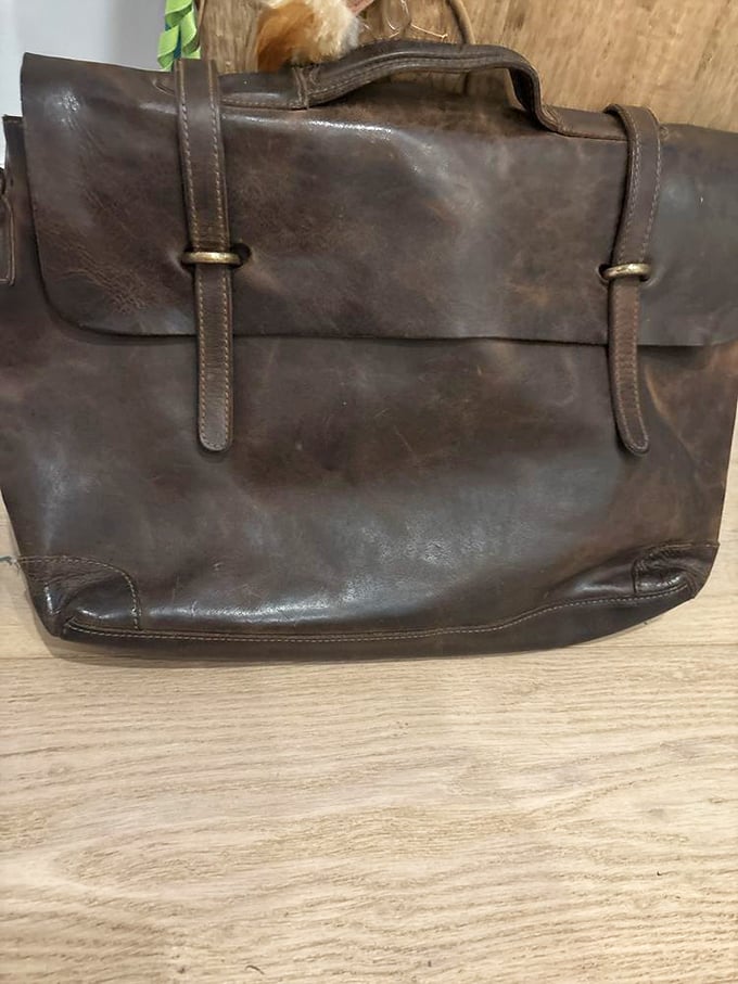 Indiana Jones, eat your heart out! This weathered leather satchel has stories to tell and adventures yet to come.