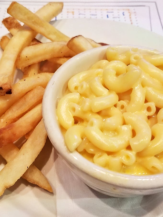 The classic pairing of golden fries and creamy mac and cheese &ndash; carbs supporting carbs in the buddy comedy of lunch plates.