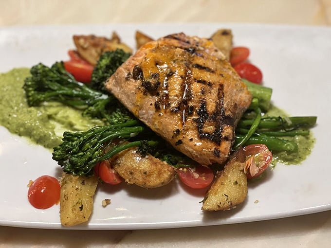 Alaskan Alder Grilled Salmon: Nature's candy, kissed by fire. This dish is so fresh, it might just swim off your plate.
