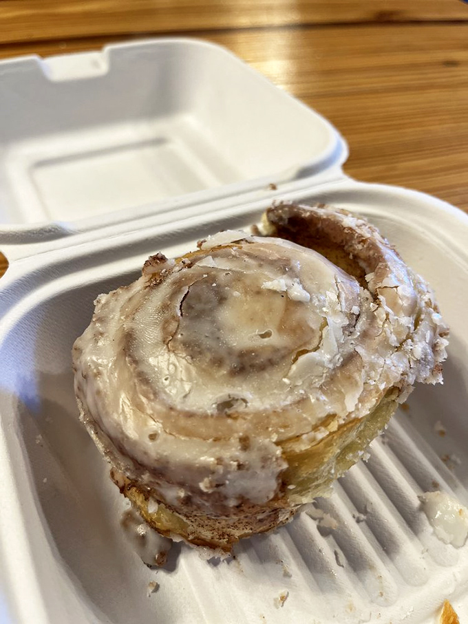 Warning: This cinnamon roll may cause spontaneous happiness. Layers of gooey goodness wrapped in a spiral of pure joy.
