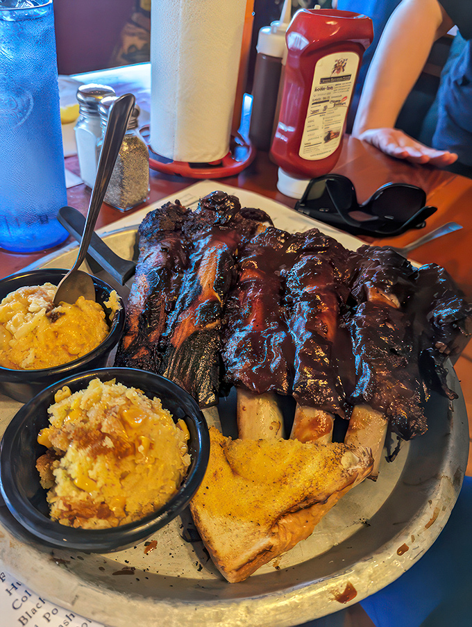 Beefy bliss on a plate! These ribs aren't just food, they're a carnivore's dream come true, glistening with smoky perfection.