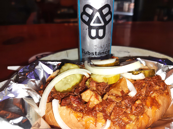 This BBQ pork sandwich is piled so high, it's like a meaty skyscraper ready to topple into deliciousness.