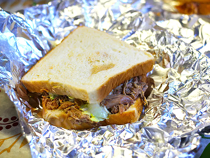 The ultimate comfort food embrace! This sandwich isn't just a meal, it's a warm hug for your taste buds, wrapped in tin foil instead of arms.