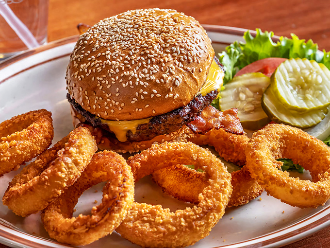 This burger's got more layers than a Shakespeare play. A tower of taste that'll make your taste buds stand and applaud!