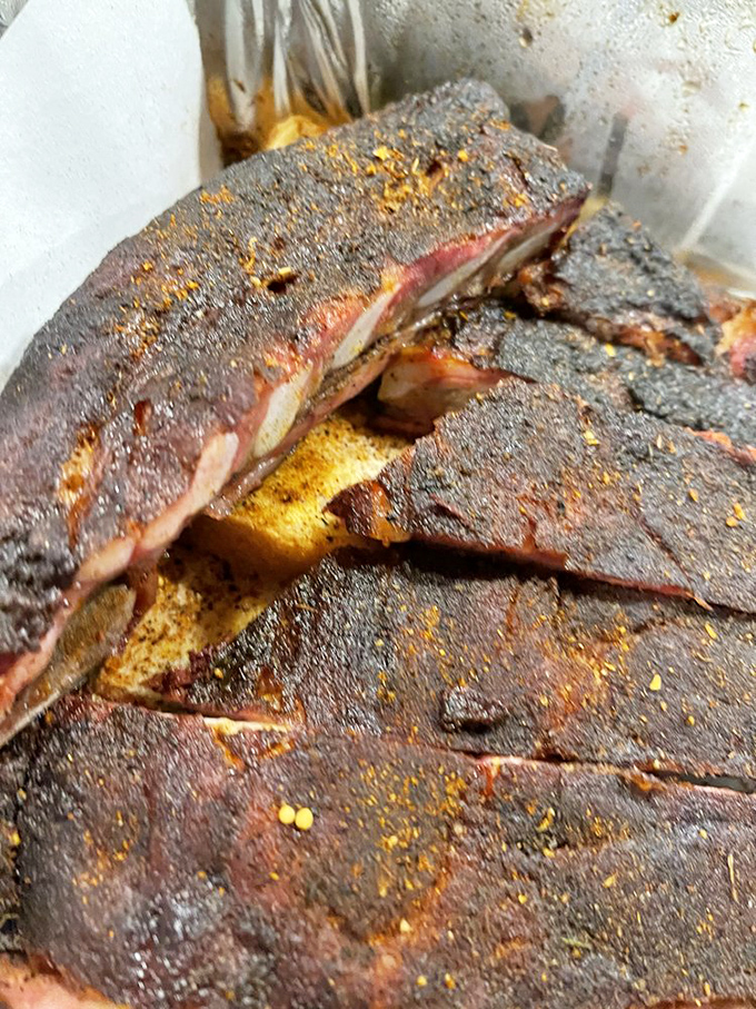 Behold, the carnivore's dream! These ribs are so perfectly charred, they could make a vegetarian question their life choices.