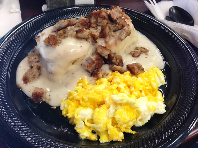 Breakfast of champions? More like breakfast of food gods! These biscuits and gravy with scrambled eggs are what dreams are made of, folks.